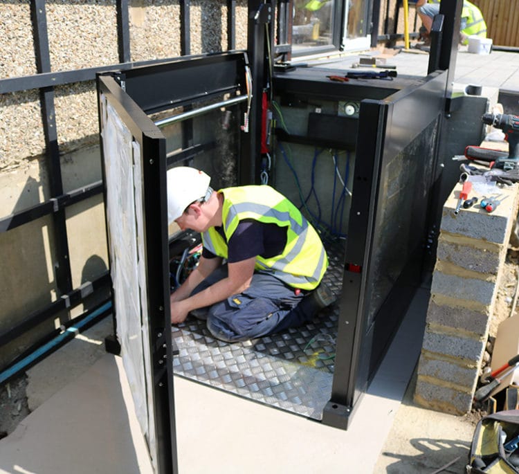 Terry-Lifts-lift-engineer-installing-a-mobility-lift_767x706